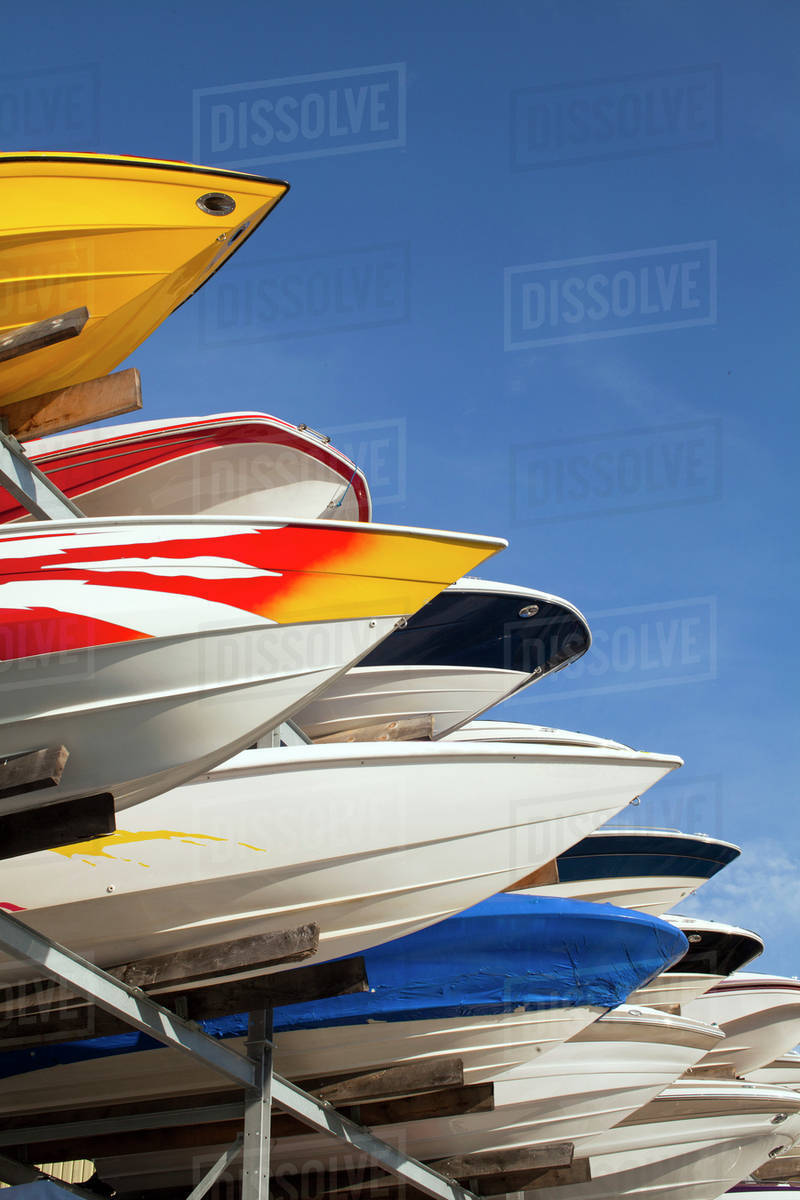 Boats stacked on rack - Royalty-free Stock Photo | Dissolve