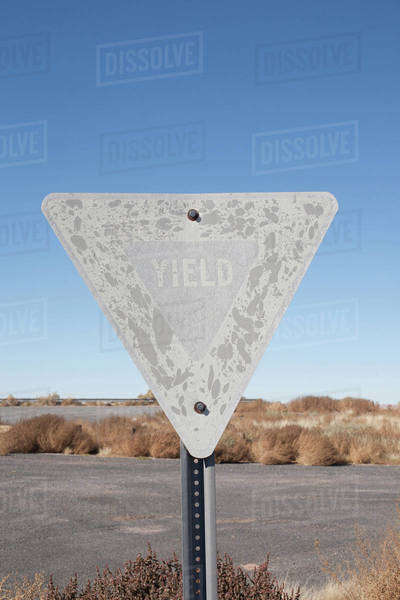 USA, Arizona, Winslow, Old yield sign - Stock Photo - Dissolve