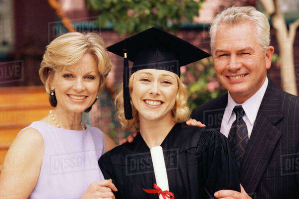 Graduate with parents - Stock Photo - Dissolve