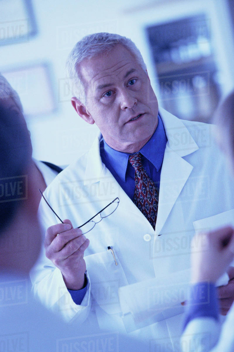 Doctor giving advice - Royalty-free Stock Photo | Dissolve