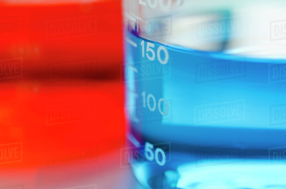Studio shot of laboratory beakers - Stock Photo - Dissolve