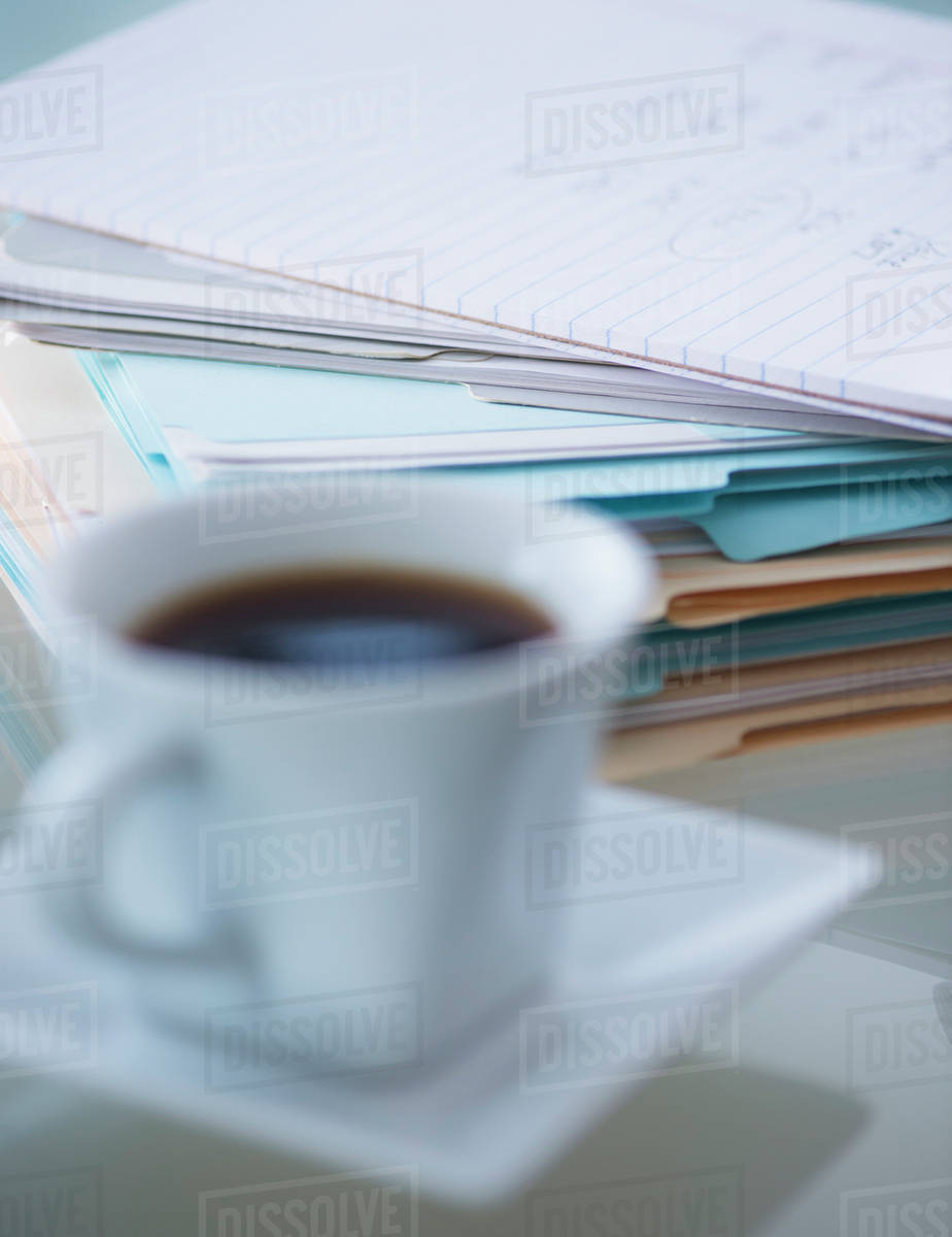 Close-up of coffee and paper material - Royalty-free Stock Photo | Dissolve