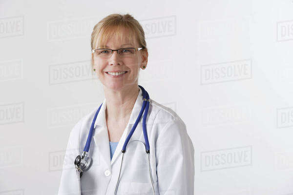 Portrait of female doctor, studio shot - Royalty-free Stock Photo ...