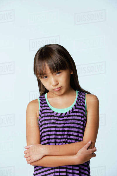 Studio portrait of girl (10-11) - Stock Photo - Dissolve