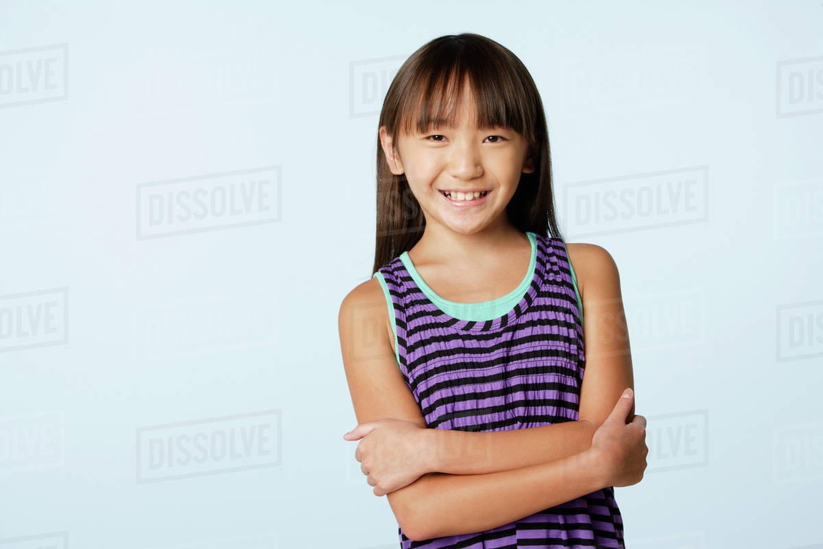 Studio portrait of girl (10-11) - Royalty-free Stock Photo | Dissolve