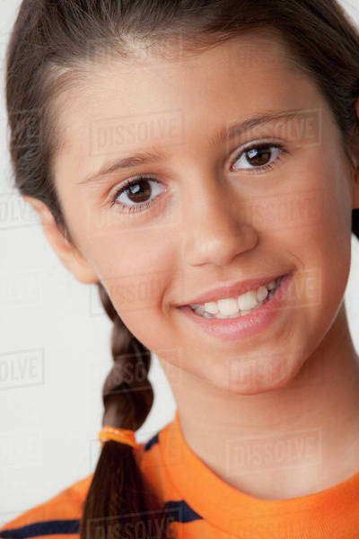 Studio portrait of girl (8-9) - Royalty-free Stock Photo | Dissolve