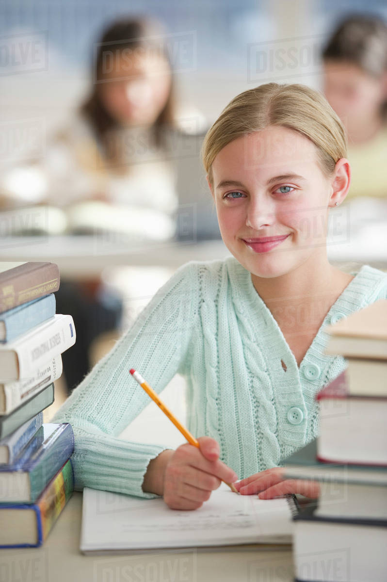 Student writing - Royalty-free Stock Photo | Dissolve