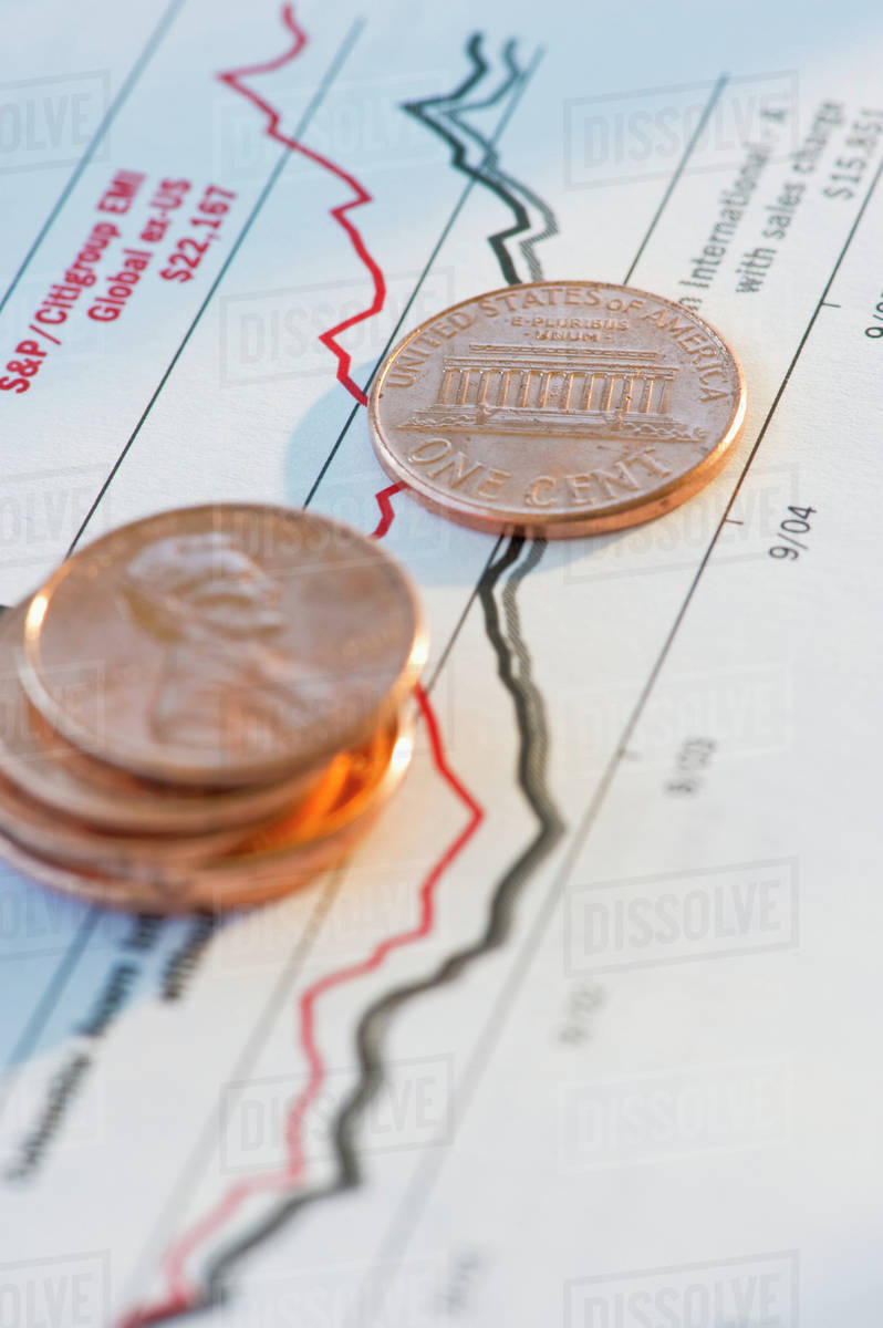 Pennies on a graph - Royalty-free Stock Photo | Dissolve