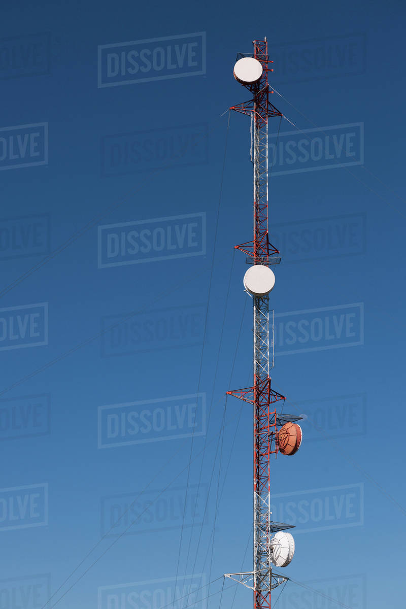 Tele-communications relay tower against blue sky - Royalty-free Stock ...
