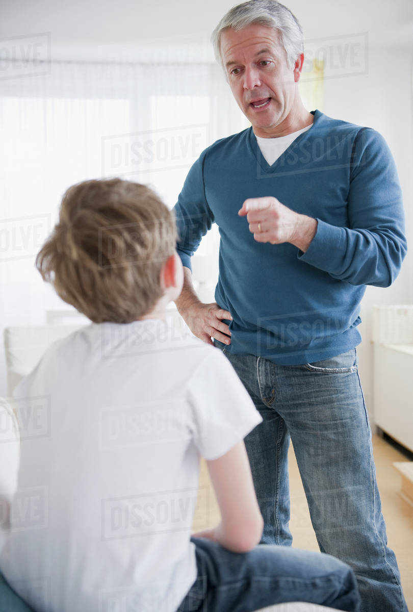 Father disciplining son - Royalty-free Stock Photo | Dissolve