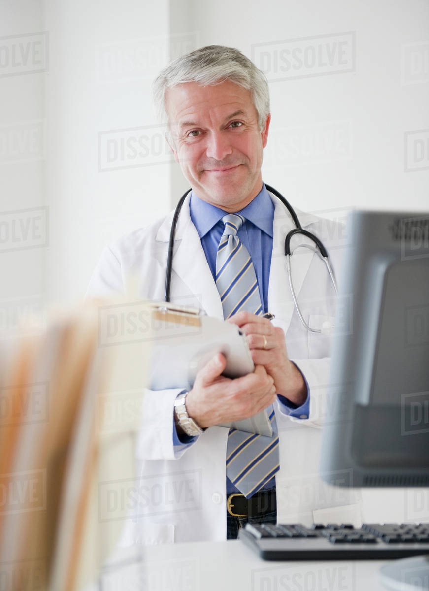 Doctor in his office - Royalty-free Stock Photo | Dissolve