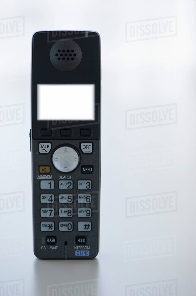Illuminated screen on telephone - Royalty-free Stock Photo | Dissolve