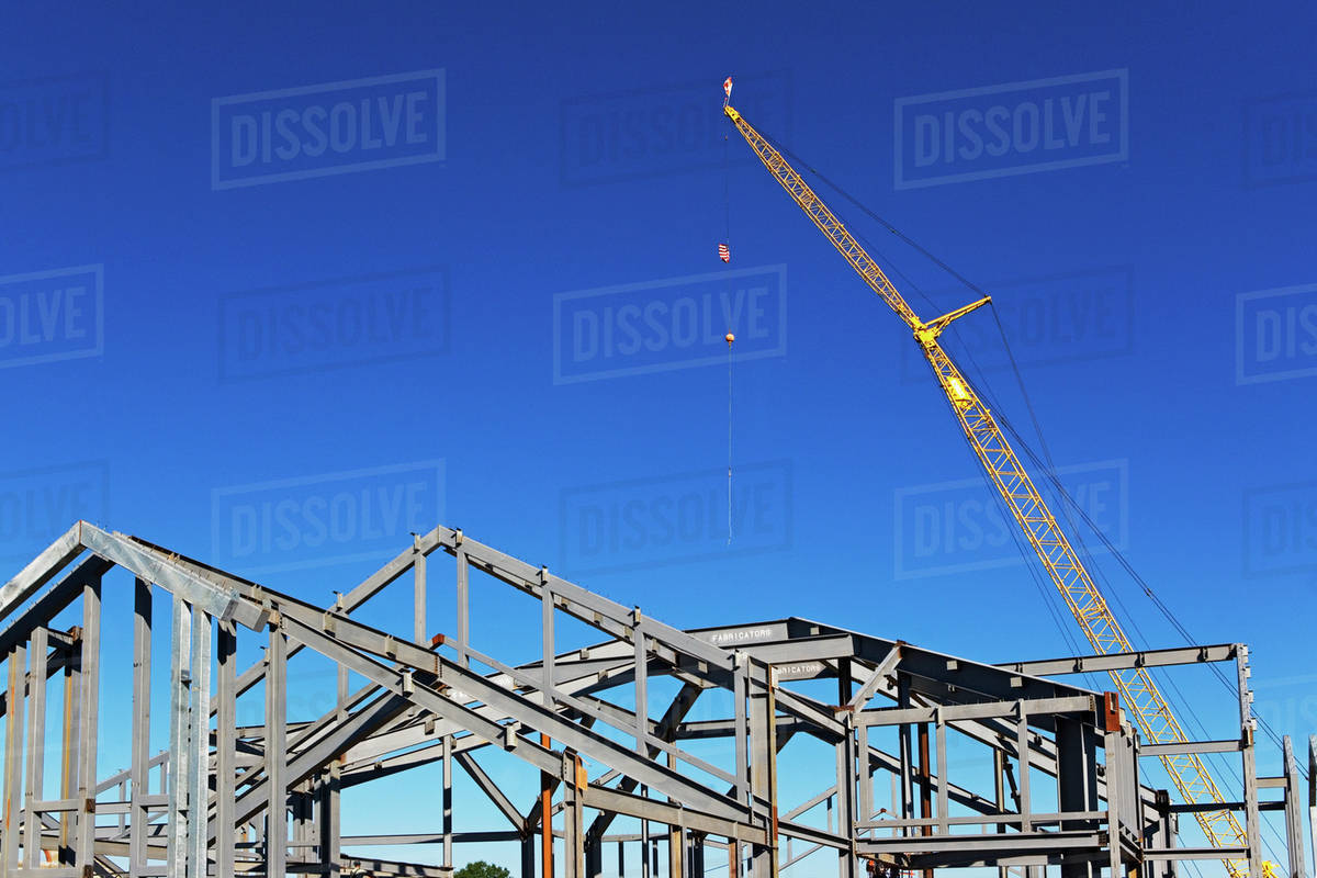 Construction frame and crane - Royalty-free Stock Photo | Dissolve