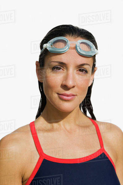 Woman wearing swimming goggles - Royalty-free Stock Photo | Dissolve