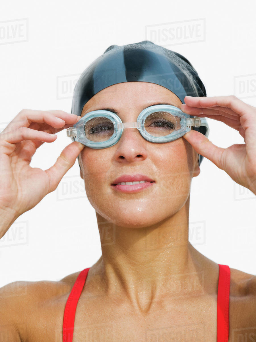 Woman wearing swimming goggles - Stock Photo - Dissolve