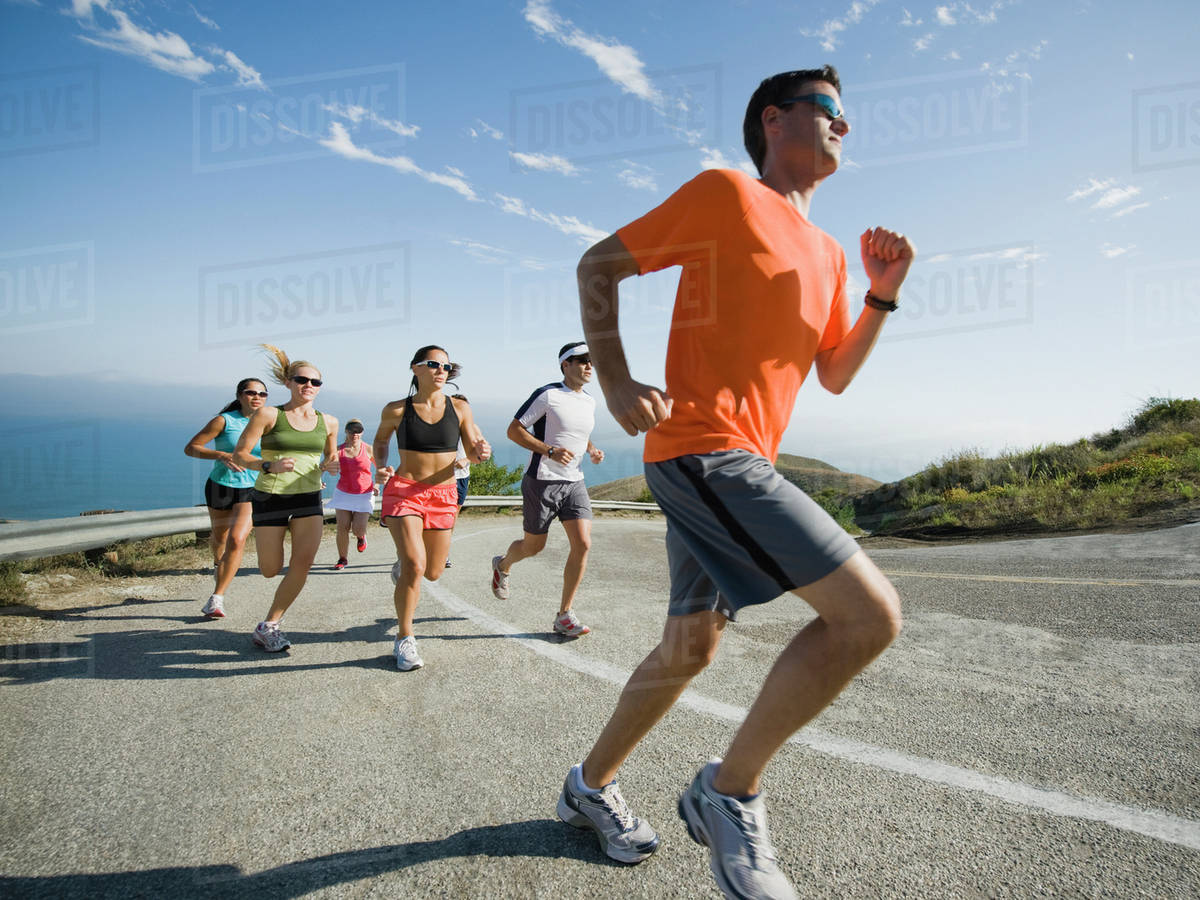 Runners on a road in Malibu - Royalty-free Stock Photo | Dissolve