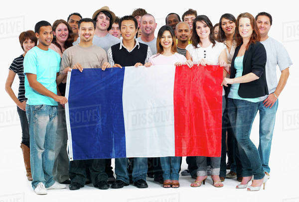 Group of people holding flag - Stock Photo - Dissolve