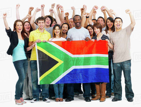 Group of people holding flag - Stock Photo - Dissolve