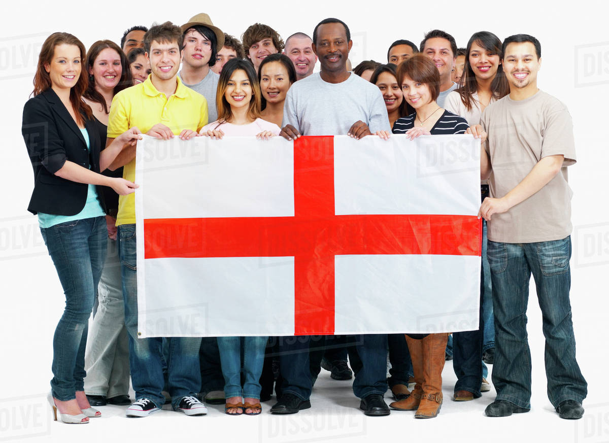 Group of people holding flag - Stock Photo - Dissolve