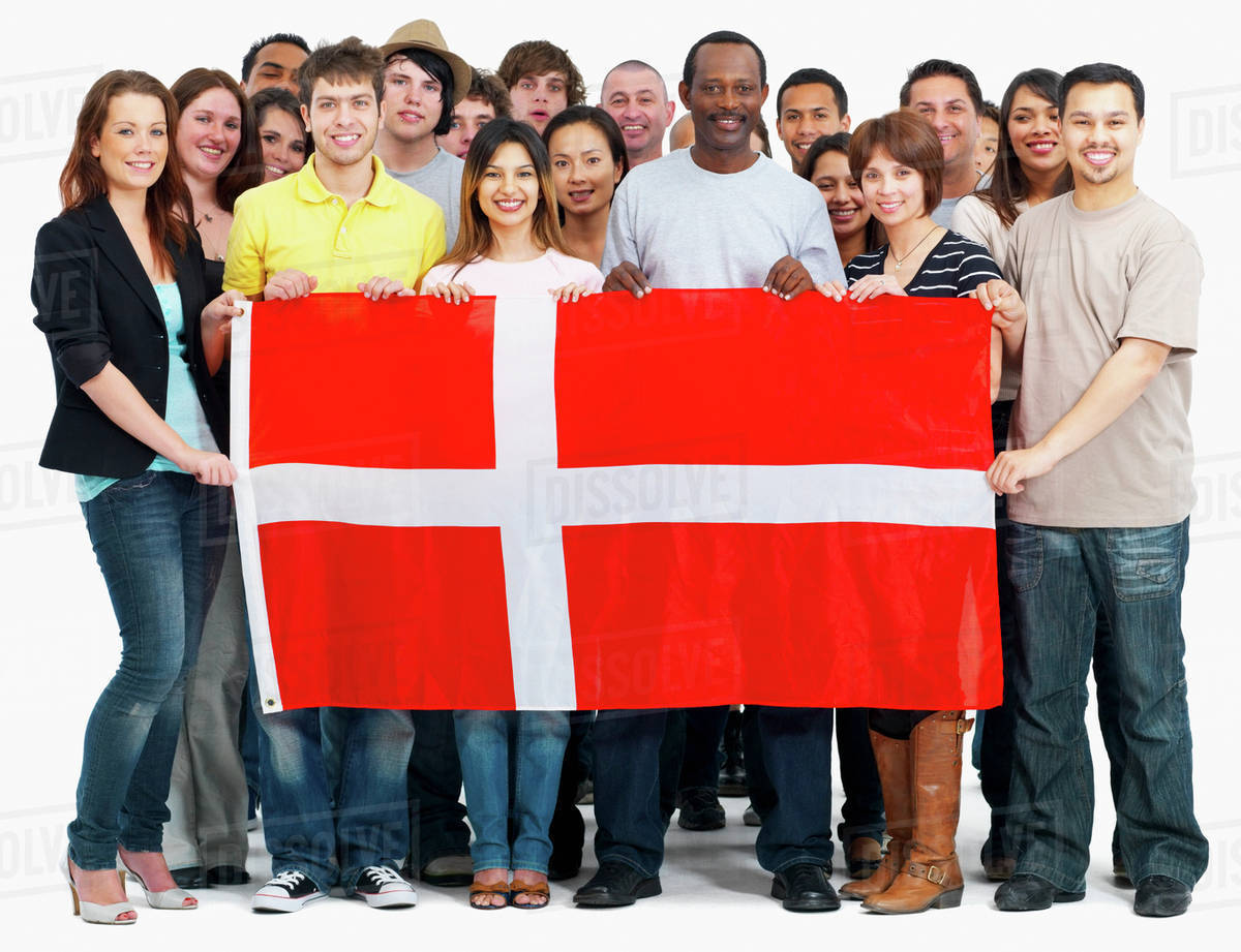 Group of people holding flag - Stock Photo - Dissolve