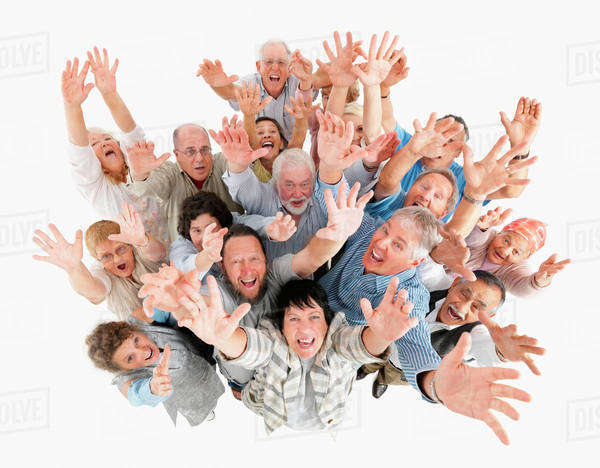 A group of people waving with their arms raised - Stock Photo - Dissolve