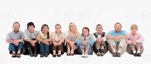 A group of people sitting on the floor in a row - Royalty-free Stock ...