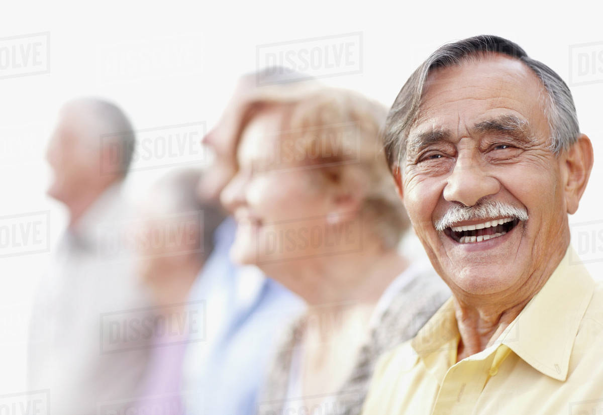 Group of seniors standing in a row - Royalty-free Stock Photo | Dissolve