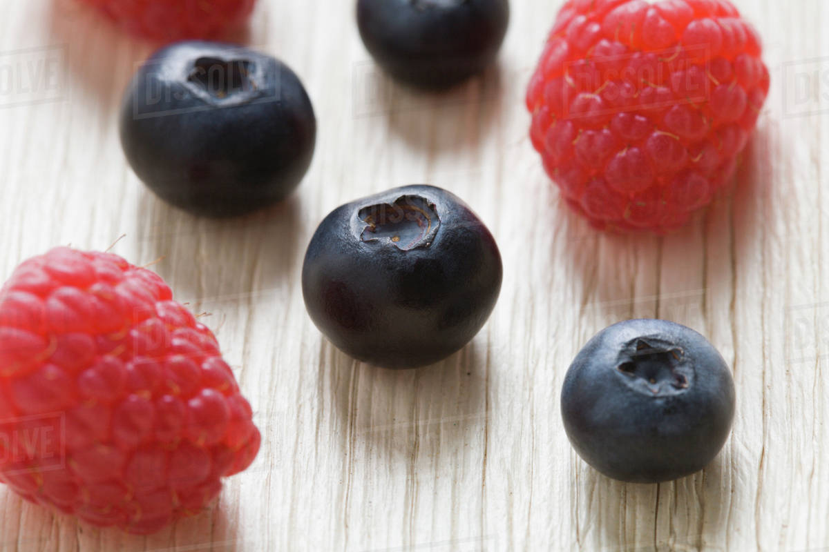Blueberries and raspberries - Stock Photo - Dissolve