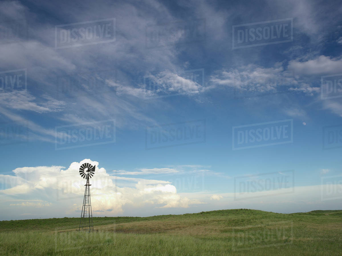 Windmill in field - Royalty-free Stock Photo | Dissolve