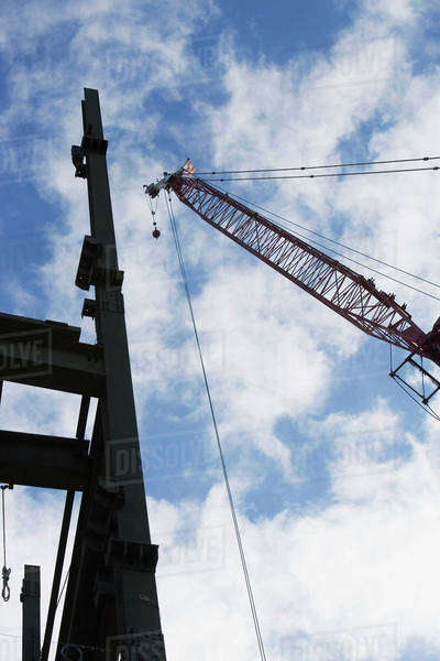 Upward view of crane and construction - Royalty-free Stock Photo | Dissolve