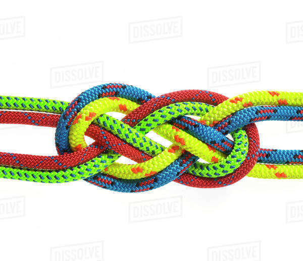 Colorful ropes looped together - Stock Photo - Dissolve