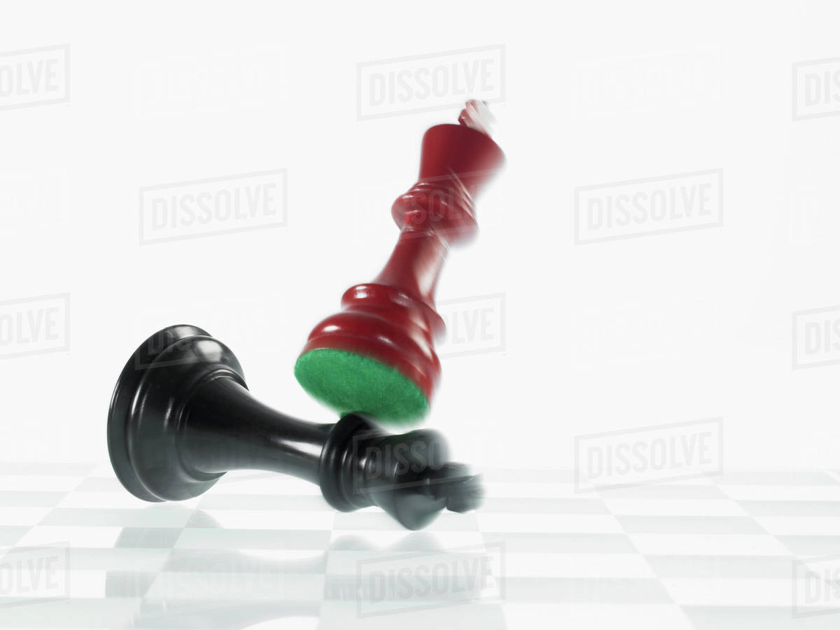 Rival king chess pieces fighting - Royalty-free Stock Photo | Dissolve