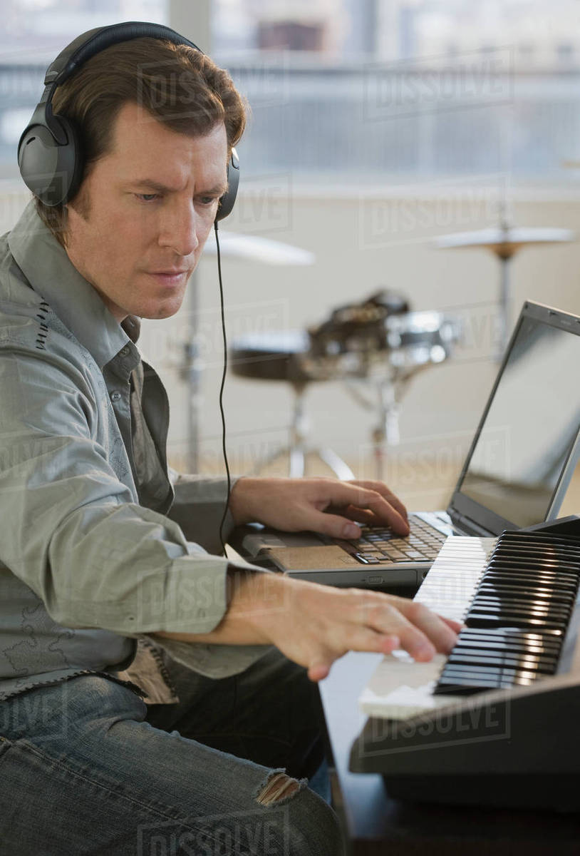 Man producing music - Royalty-free Stock Photo | Dissolve