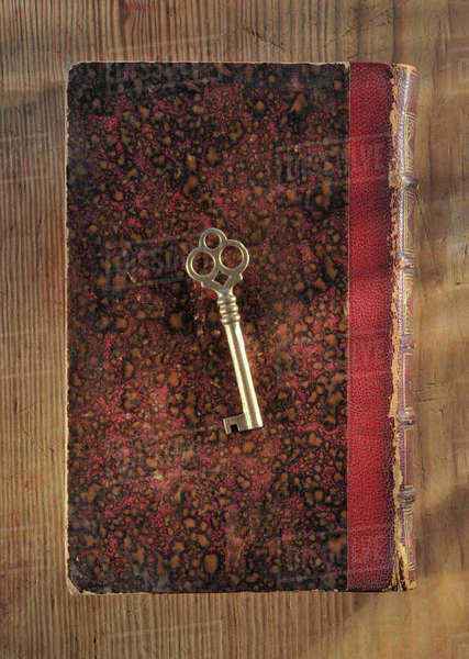 Antique book and key - Royalty-free Stock Photo | Dissolve