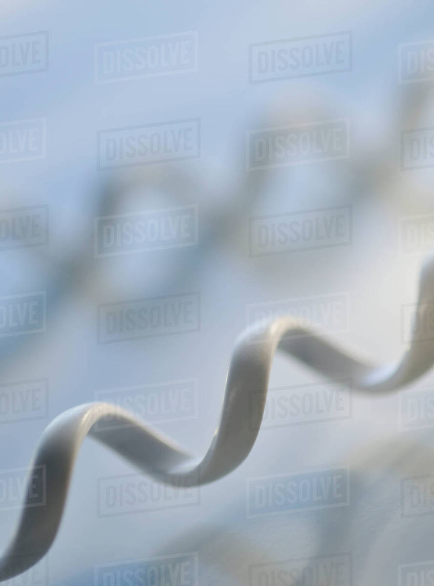 Close up of telephone cord - Stock Photo - Dissolve