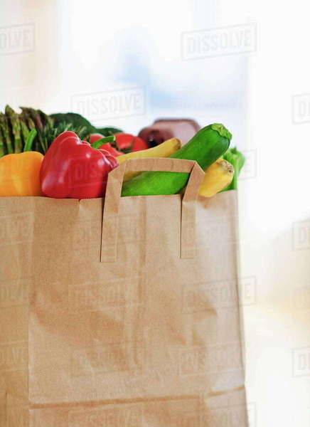 Paper bag filled with vegetables - Royalty-free Stock Photo | Dissolve