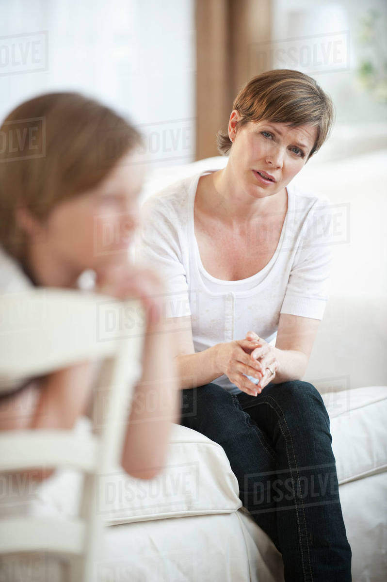 Mother talking with child - Stock Photo - Dissolve
