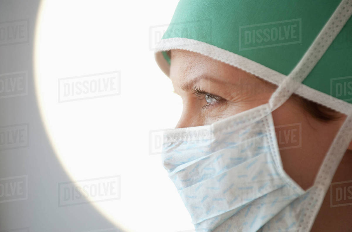 Female doctor with surgical mask - Royalty-free Stock Photo | Dissolve