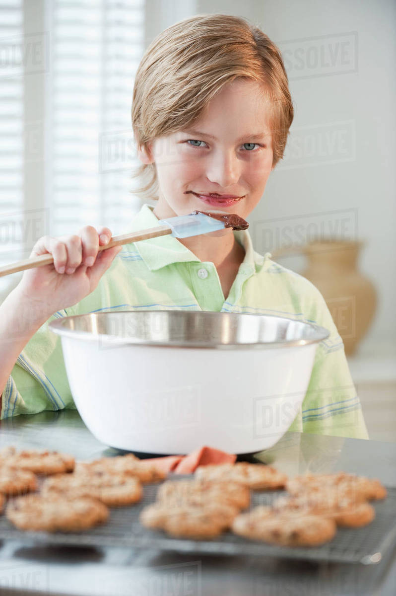Child baking cookies - Royalty-free Stock Photo | Dissolve