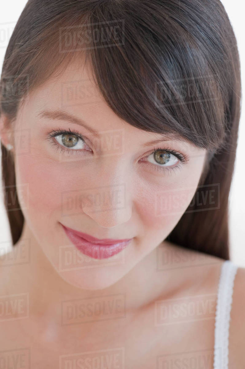 Woman looking into camera - Royalty-free Stock Photo | Dissolve