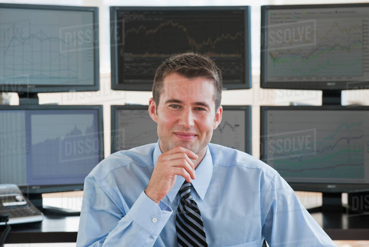 Male trader at work - Royalty-free Stock Photo | Dissolve