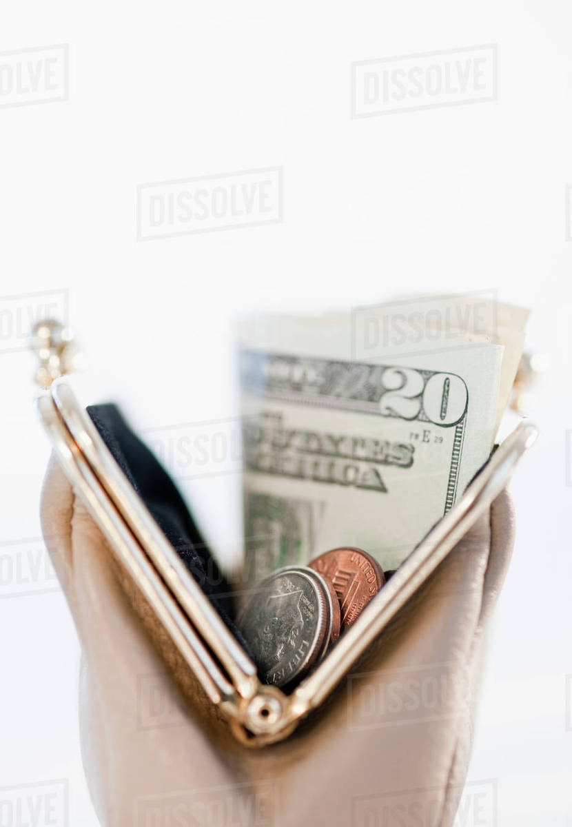 Money in change purse - Royalty-free Stock Photo | Dissolve