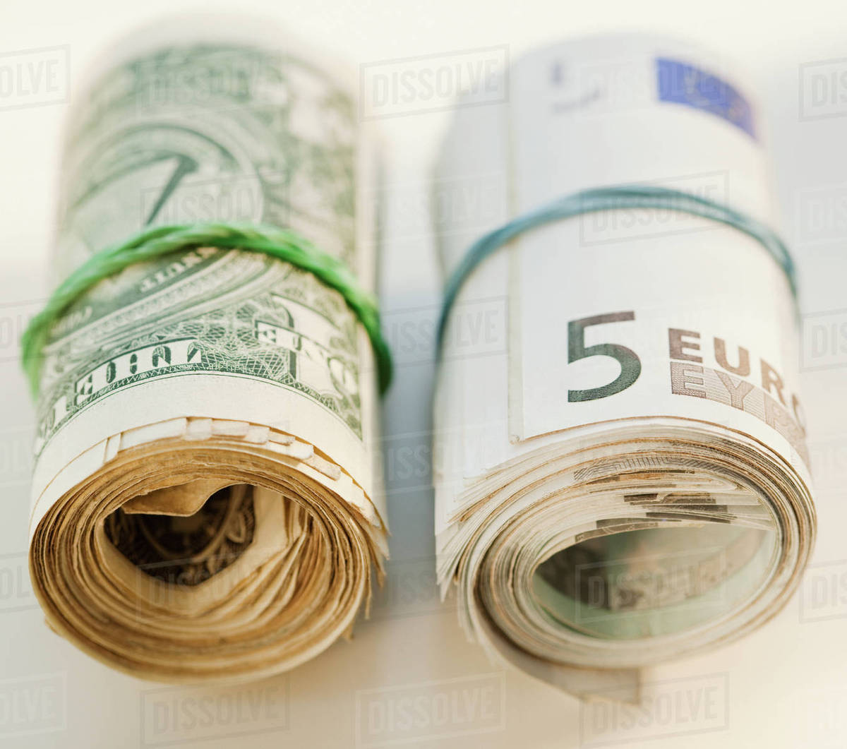 Rolls of cash - Stock Photo - Dissolve