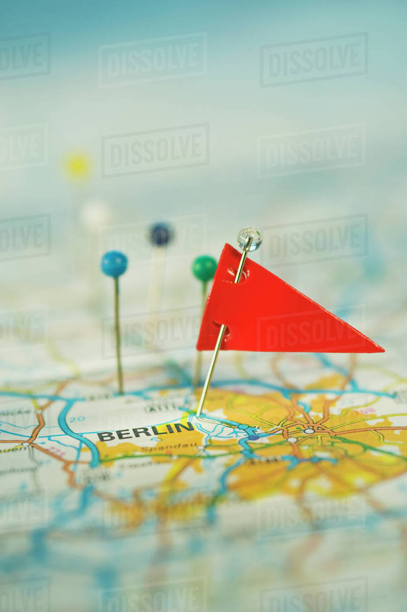 Close up of pins on map locations - Royalty-free Stock Photo | Dissolve