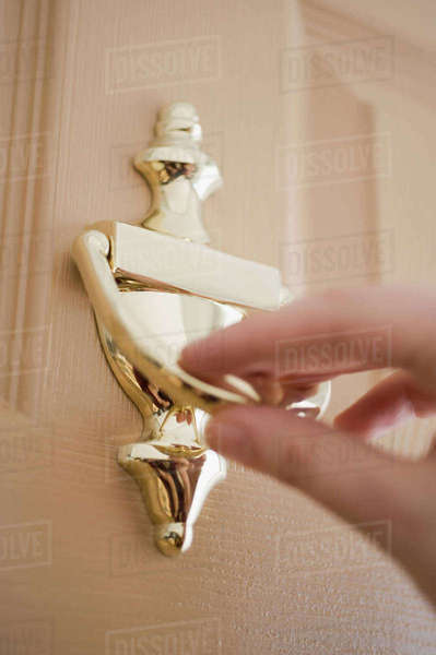 Person knocking on door - Royalty-free Stock Photo | Dissolve