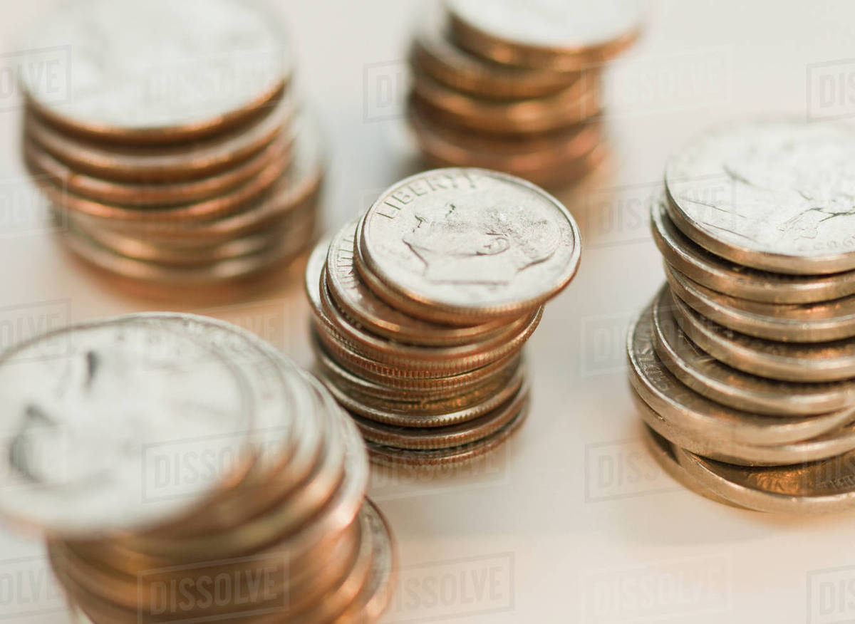Close up of stacks of coins - Royalty-free Stock Photo | Dissolve