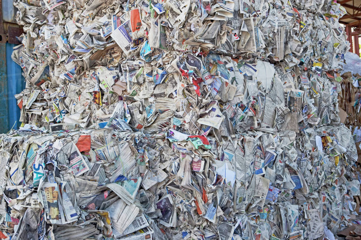 Bundles of paper at recycling plant - Royalty-free Stock Photo | Dissolve