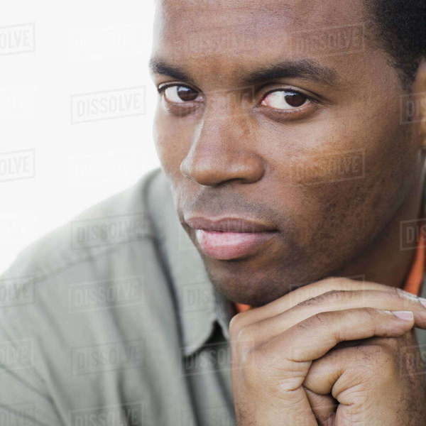 Studio portrait of man, close-up - Royalty-free Stock Photo | Dissolve