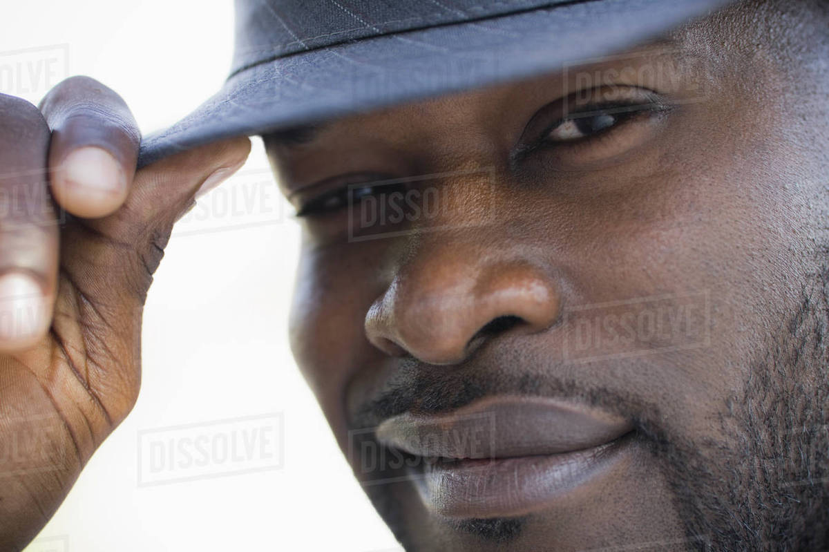 A man outdoors wearing a hat - Royalty-free Stock Photo | Dissolve