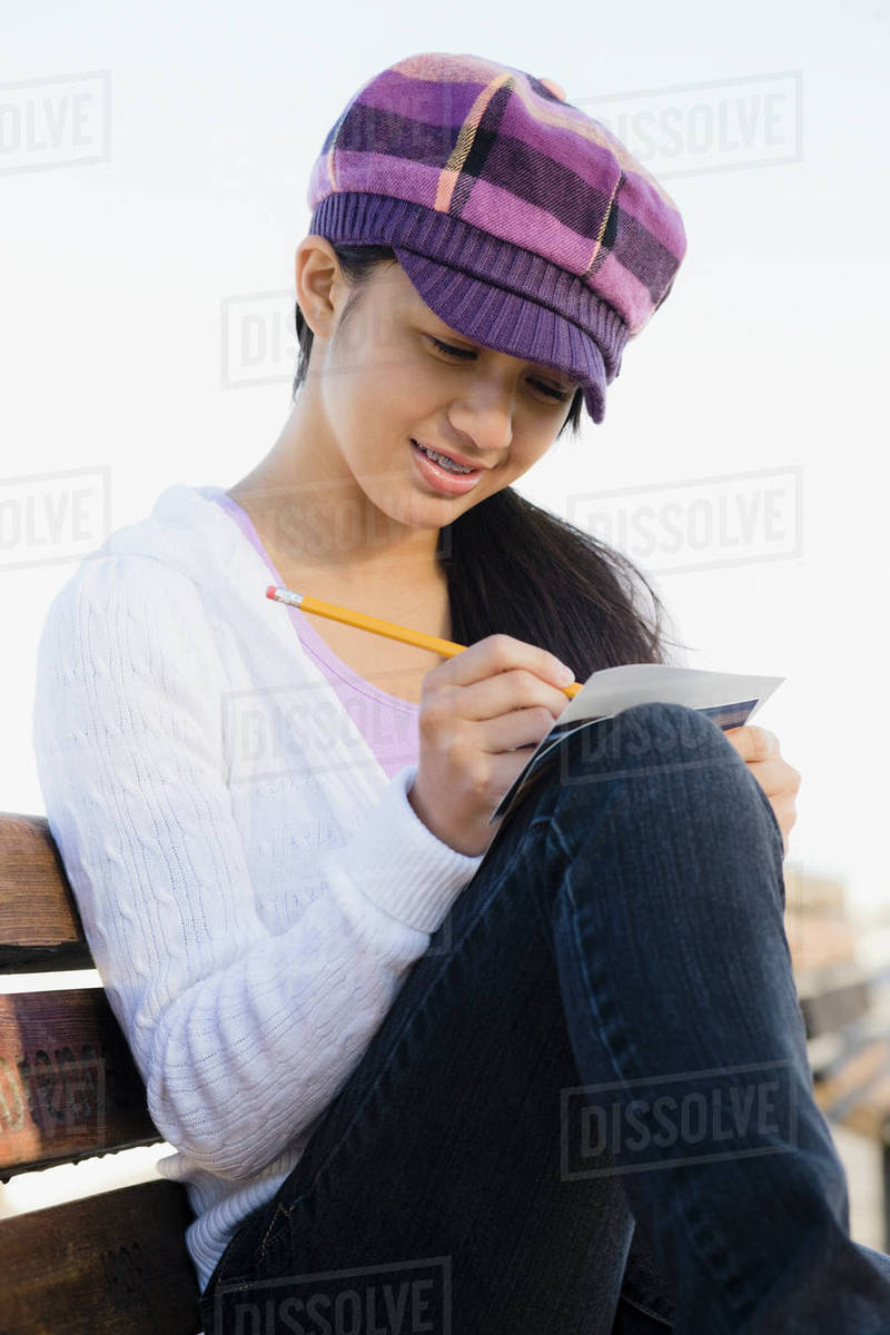 Girl writing - Stock Photo - Dissolve